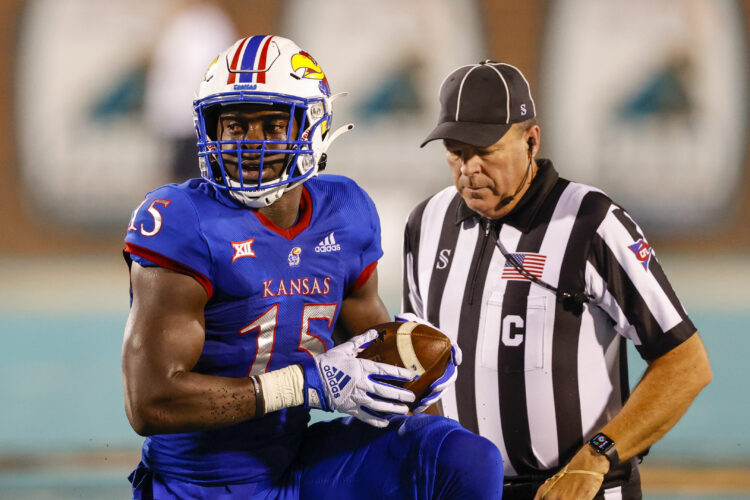 KU football veteran Kyron Johnson moves back to LB — at least for one ...